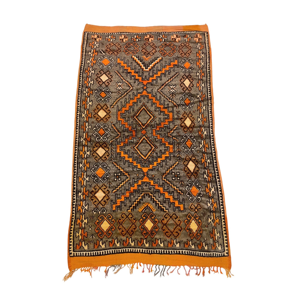 dark orange patterned rug