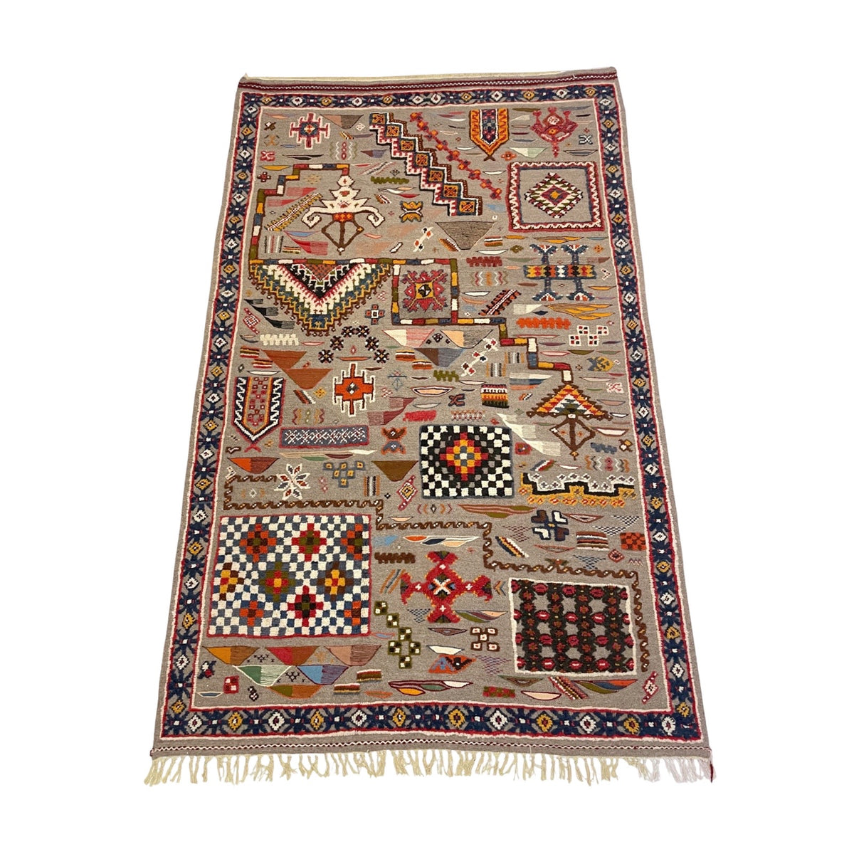 Grey Moroccan rug with playful, colorful designs– Kantara | Moroccan Rugs